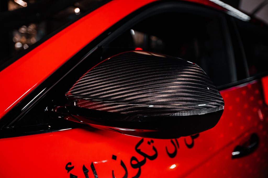 Aggressive and bright Lamborghini Urus with carbon fiber TopCar Design ...